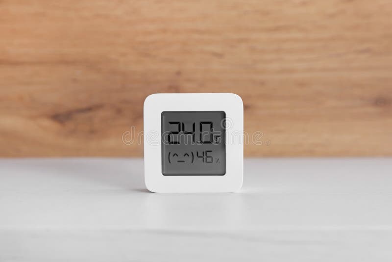 Digital Hygrometer with Thermometer on White Table Stock Image - Image ...