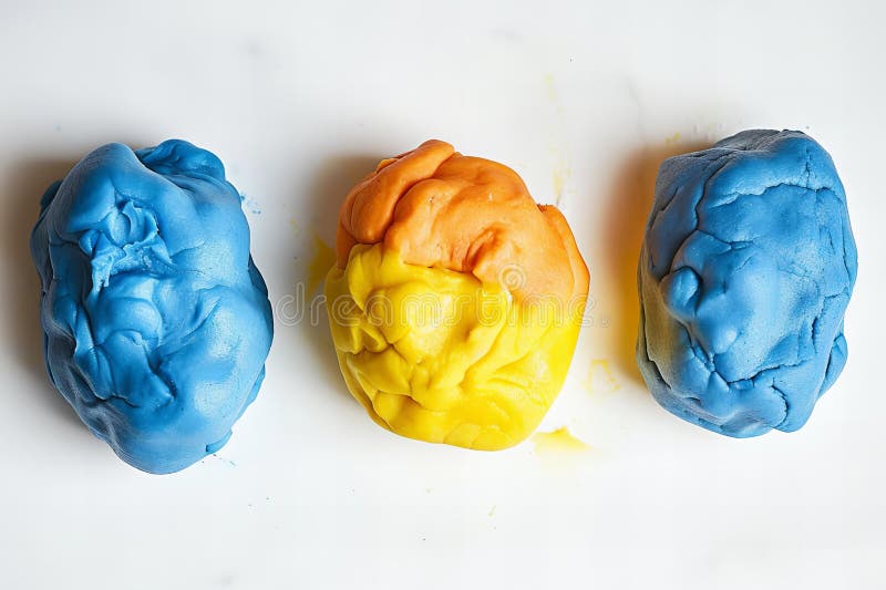 Digital Image of Three Pieces of Playdough in Blue, Orange and Yellow ...