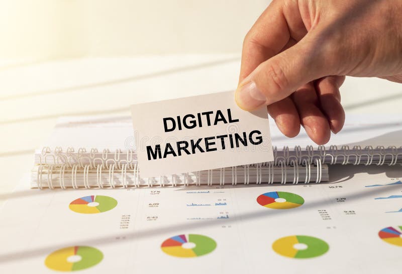 Digital Marketing Text on Paper in Male Hand Over Office Table with ...