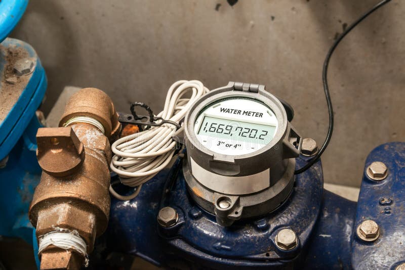 Water Meter in Building with Commercial and Residential Units. Stock ...
