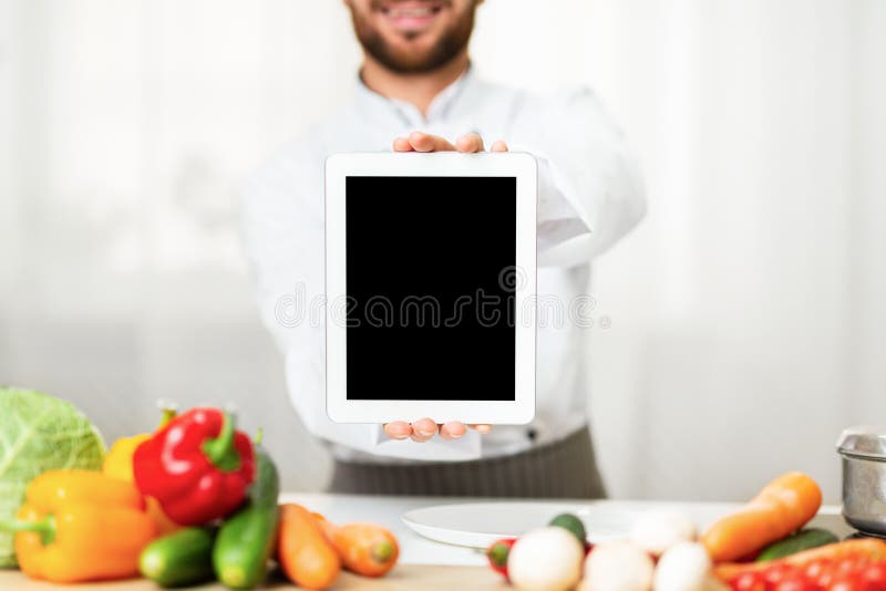 Chef Man Showing Tablet Screen Standing in Restaurant Kitchen, Cropped ...