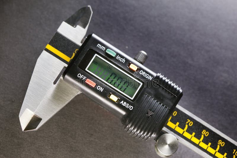 Digital Micrometer Industrial Still Life on a Black Background Stock ...