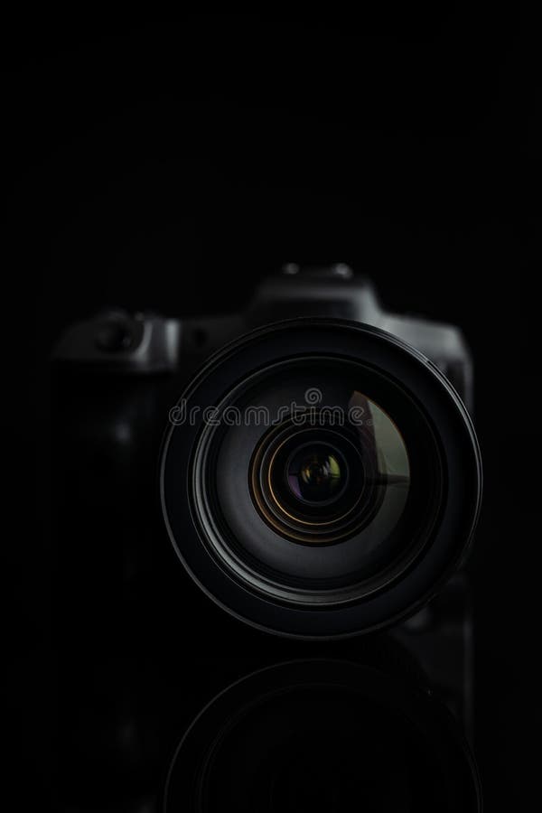 Digital Mirrorless Camera on Black Background. Lens Closeup. Front View ...