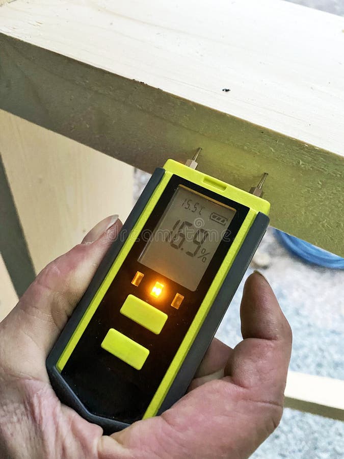 Digital Moisture Meter Checker, Construction Worker Measures Moisture ...