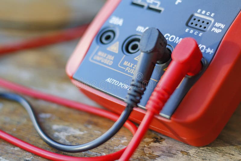 Digital Multimeter with Connected Probes on a Wooden Table Stock Image ...