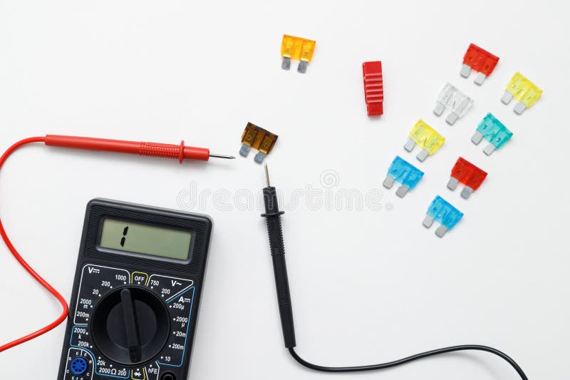Digital Multimeter for Measuring Electrical Elements and Car Fuses on a ...