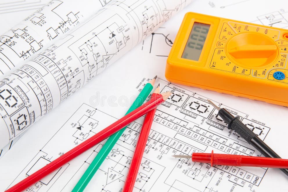 Digital Multimeter and Pencils on Paper Electrical Engineering Drawings ...