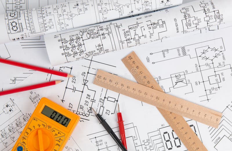 Digital Multimeter and Pencils on Paper Electrical Engineering Drawings ...