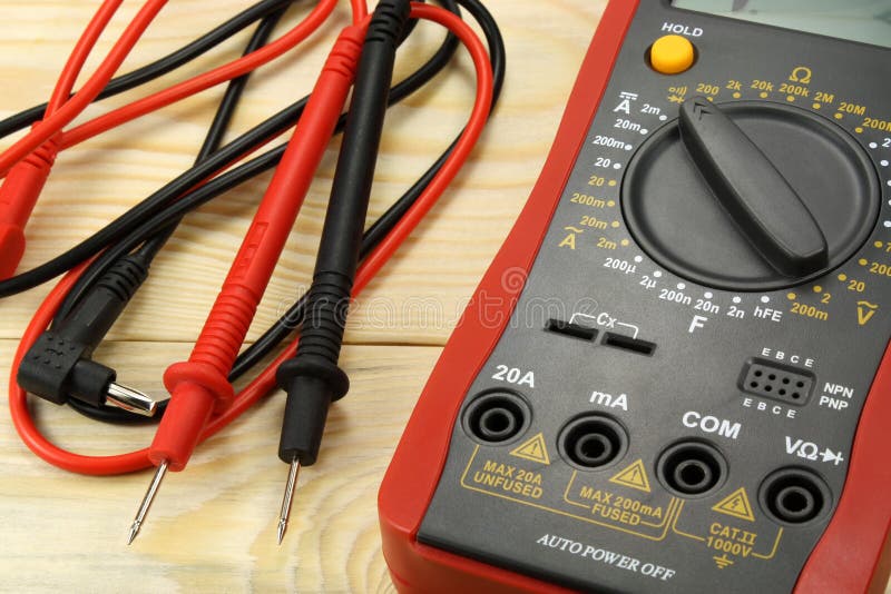 Digital Multimeter with Probe on a Wooden Table Stock Image - Image of ...