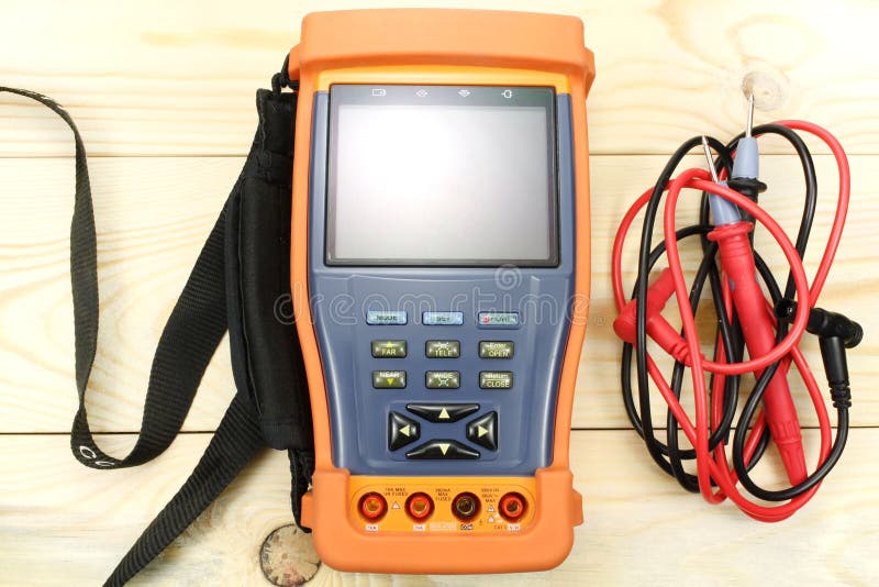 Digital Multimeter with Probe on a Wooden Table Stock Photo - Image of ...