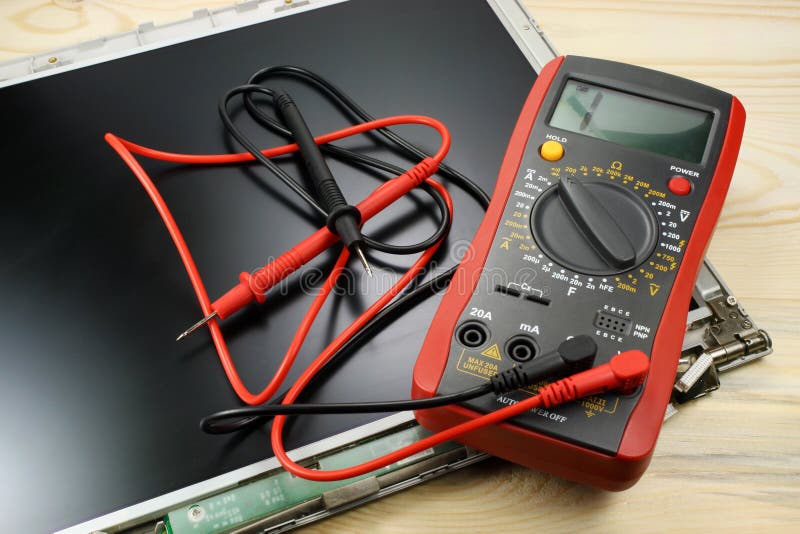 Digital Multimeter with Probe on a Wooden Table Stock Image - Image of ...