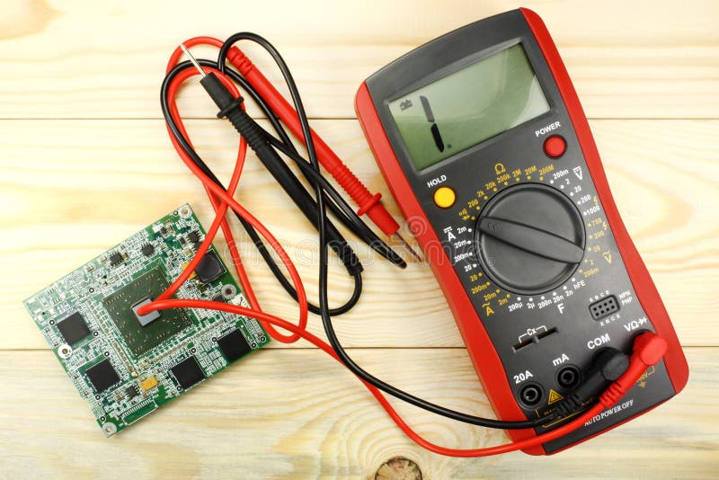 Digital Multimeter with Probes on a Wooden Table Stock Photo - Image of ...