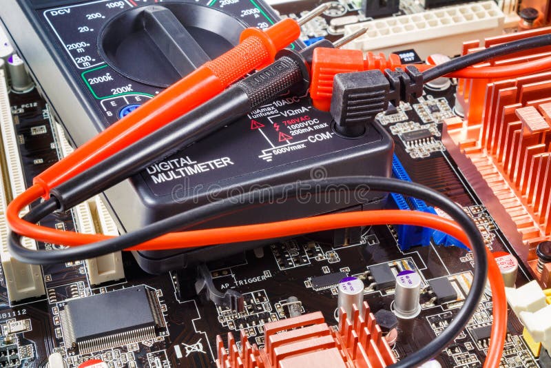 Digital Multimeter with Red and Black Probes on the Computer ...