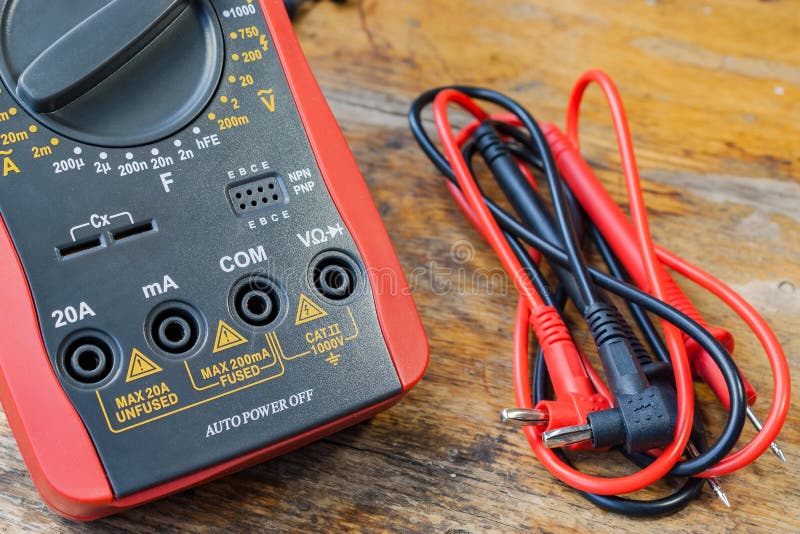 Digital Multimeter and Set of Probes on a Table in a Workshop Stock ...