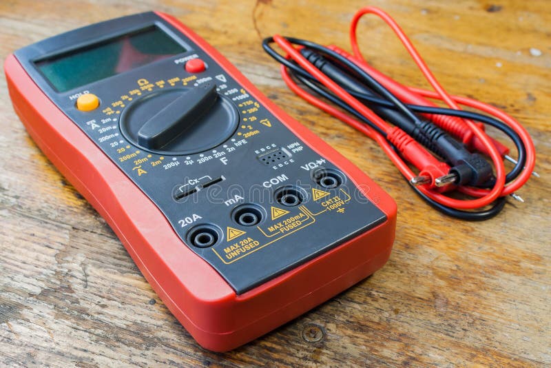 Digital Multimeter and Set of Probes on a Table in a Workshop Stock ...