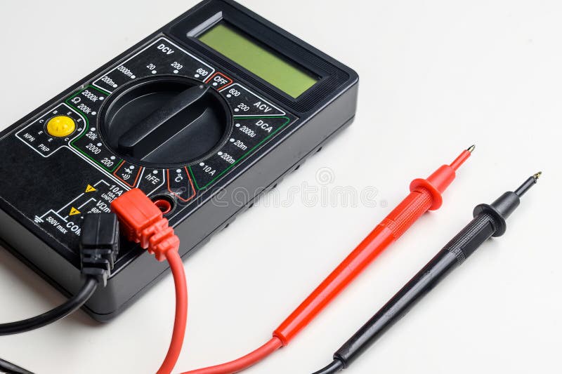 Digital Multimeter with Test Leads on a White Table. a Multimeter is an ...