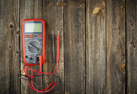 Digital Multimeter on a Wooden Table. Copy Space Stock Photo - Image of ...
