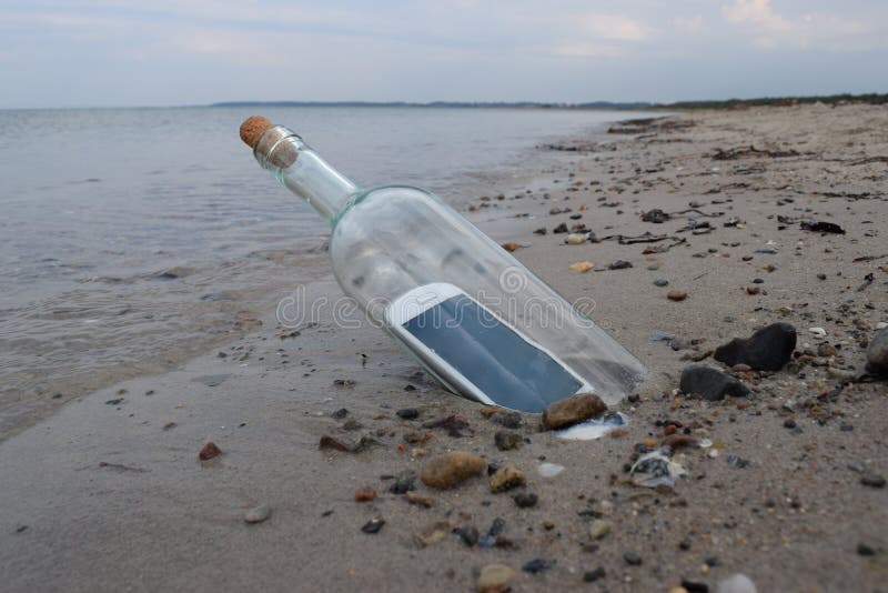 Digital Native Castaway Sending a Help Message in a Bottle Stock Image ...