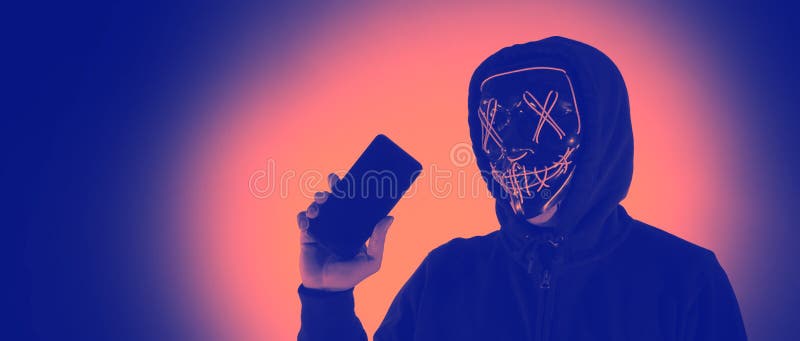 Digital Security Concept. Anonymous Hacker with Mask Holding Smartphone ...