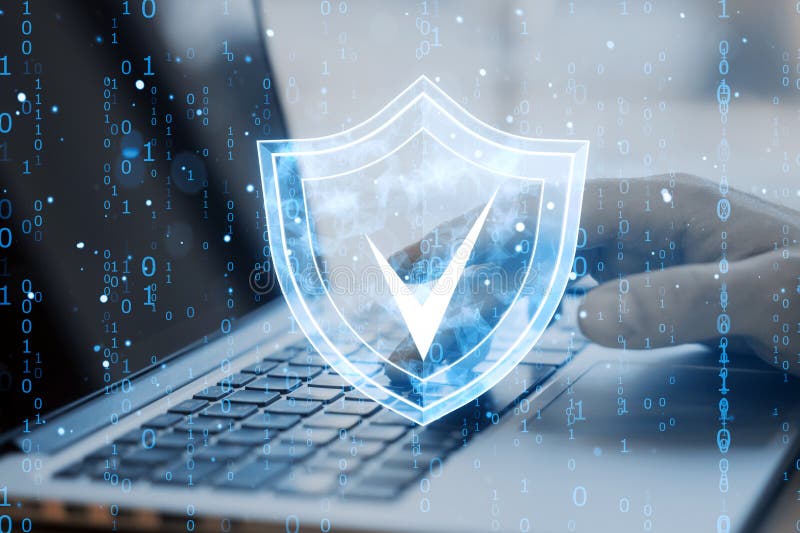 Digital Shield Icon Overlaying a Laptop Keyboard, Representing ...