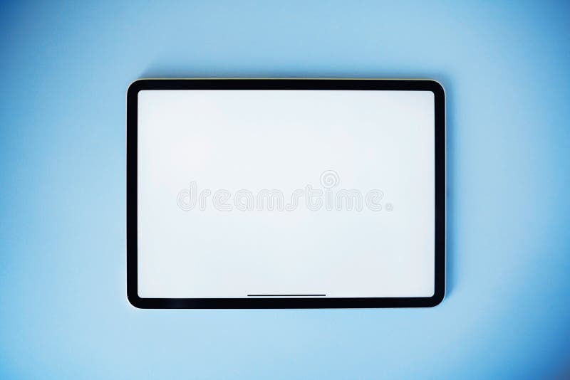 Digital tablet on blue stock image. Image of design - 166182235