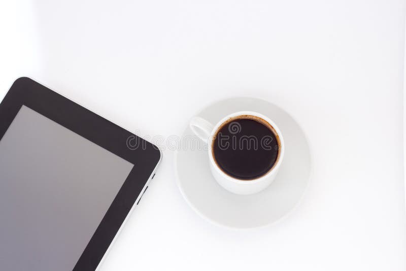 Digital Tablet and Coffee Cup on White Table. Stock Image - Image of ...