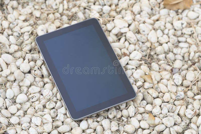 Digital Tablet Device on Stone Stock Image - Image of rock, touch: 71180069