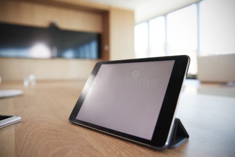Digital Tablet on Empty Boardroom Table in Office Stock Image - Image ...