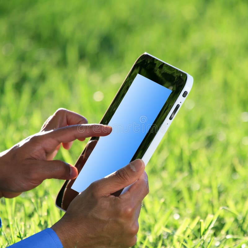 Digital tablet in hands stock photo. Image of field, portable - 20047556