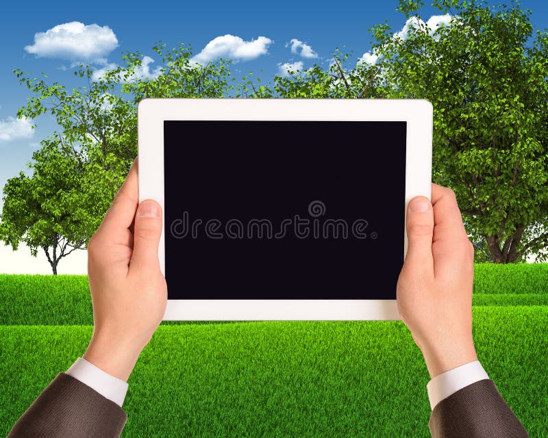 Digital Tablet in Hands with Grass Field and Trees Stock Image - Image ...