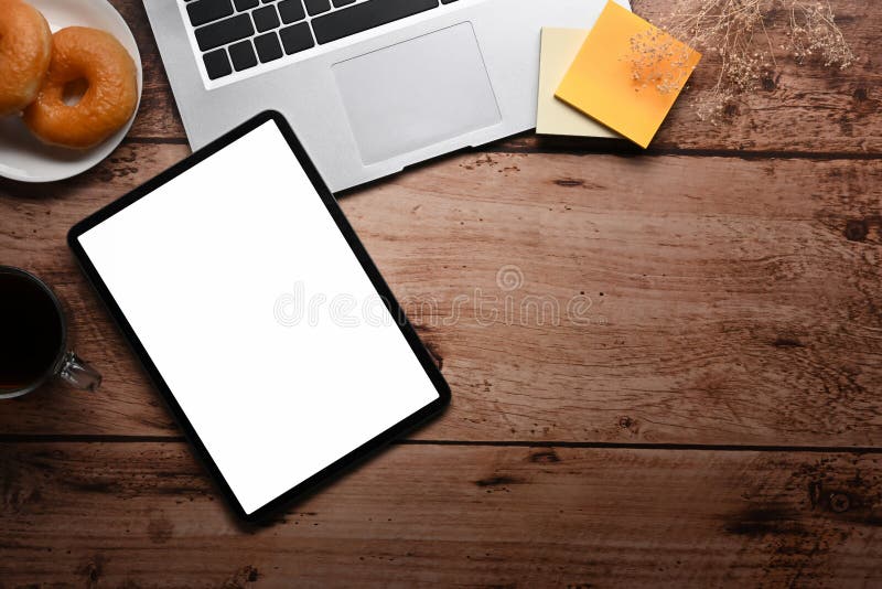 Digital Tablet, Laptop Computer and Sticky Notes on Wooden Table. Stock ...