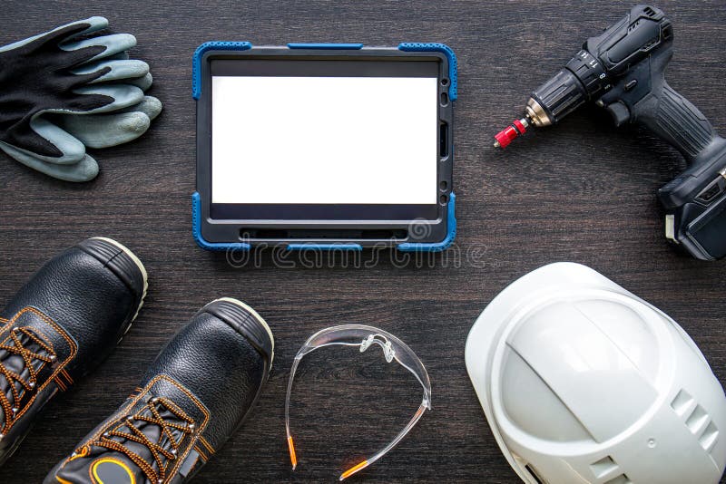 Digital Tablet with Layout and Worker Clothes, Top View. Stock Photo ...