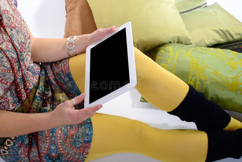 Digital Tablet on the Legs of a Young Woman Stock Photo - Image of ...