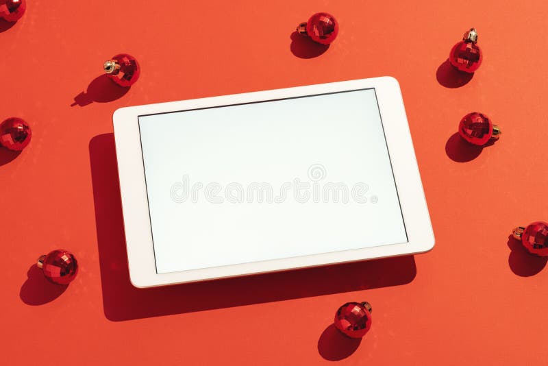 Digital Tablet Mockup on Red Background with Christmas Balls Stock ...