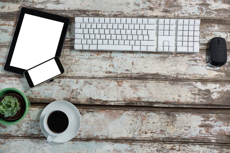 Digital Tablet, Smartphone, Keyboard and Mouse with Coffee Cup Stock ...