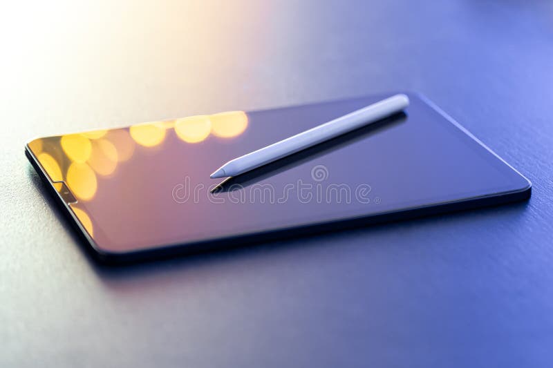 Digital Tablet and Stylus Pen on the Table Close-up. Stock Photo ...