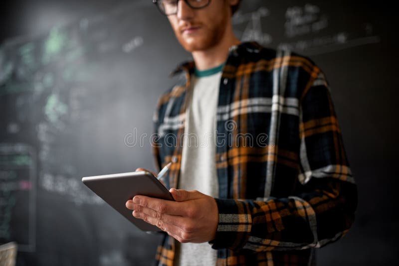 Digital Tablet Using Cropped Young Male Teacher Stock Photo - Image of ...