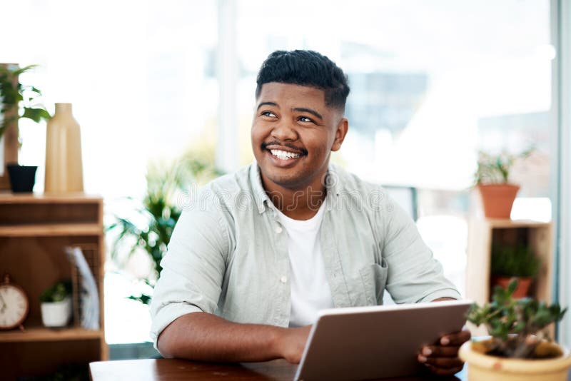 Digital Tech Gets so Much More Done. a Young Businessman Using a ...