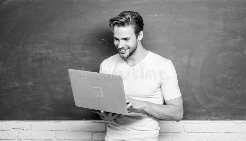 School Teacher Programming with Laptop. Student Learn Programming ... School Teacher Programming with Laptop. Student Learn Programming ...