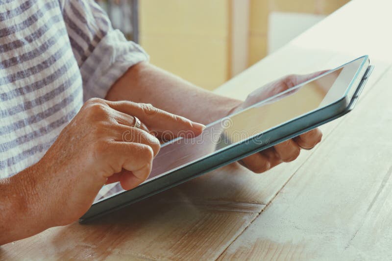Woman Using a Digital Tablet, Finger on Touchscreen Stock Image - Image ...
