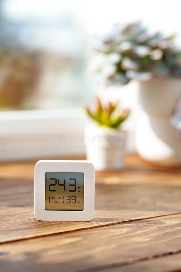 Digital Thermometer Displaying Temperature and Humidity Near Window ... Digital Thermometer Displaying Temperature and Humidity Near Window ...