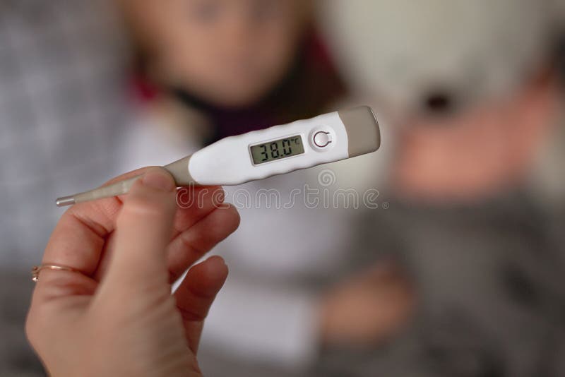 Digital Thermometer with a High Temperature of 38 Degrees Holds in Your ...