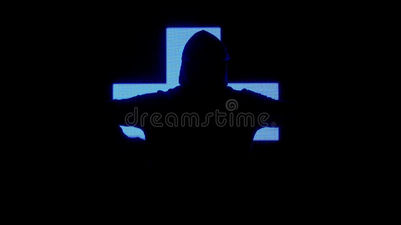 Male Against Digital Wall. Man Silhouette Dancing Techno Dance on Stage ...