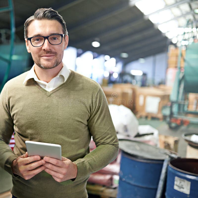 Digital Warehouse Organization. a Man Holding a Digital Tablet in a ...