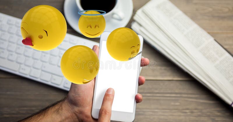 Digitally Generated Image of Emojis Flying Over Hands Using Smart Phone ...