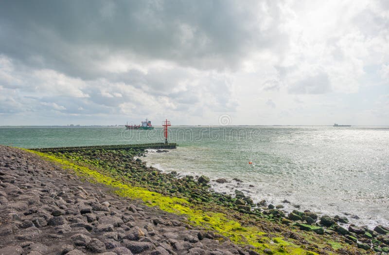 Protecting Land Against the Sea in Sunlight Stock Photo - Image of ...