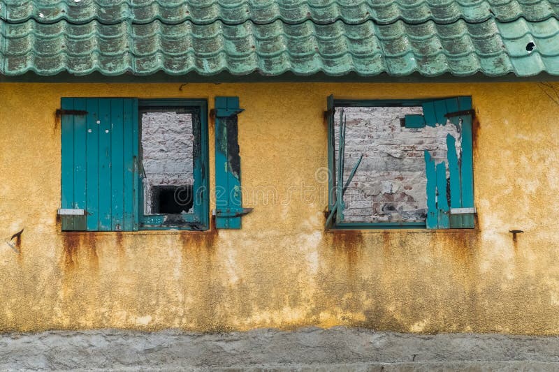 Dilapidated Building with Broken Windows and Peeling Paint, Showing ...