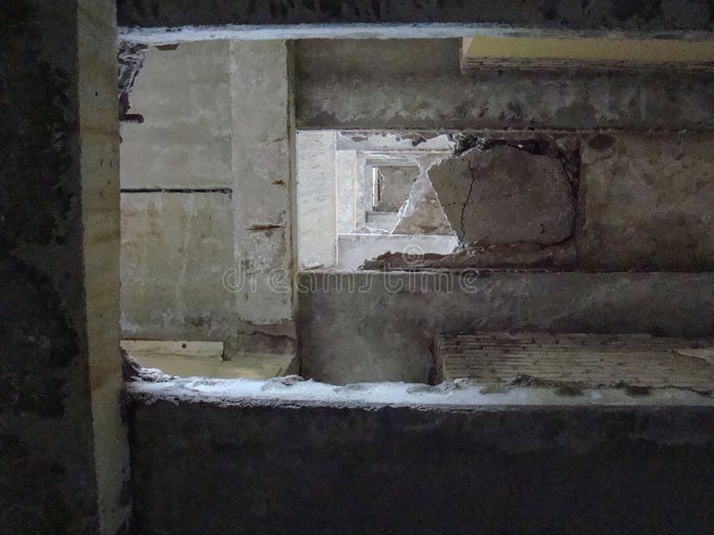 A Dilapidated Building Interior, with Exposed Beams, Compromised ...