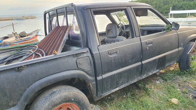 Dilapidated Car Abandoned Near Beach Area Stock Photo - Image of ...