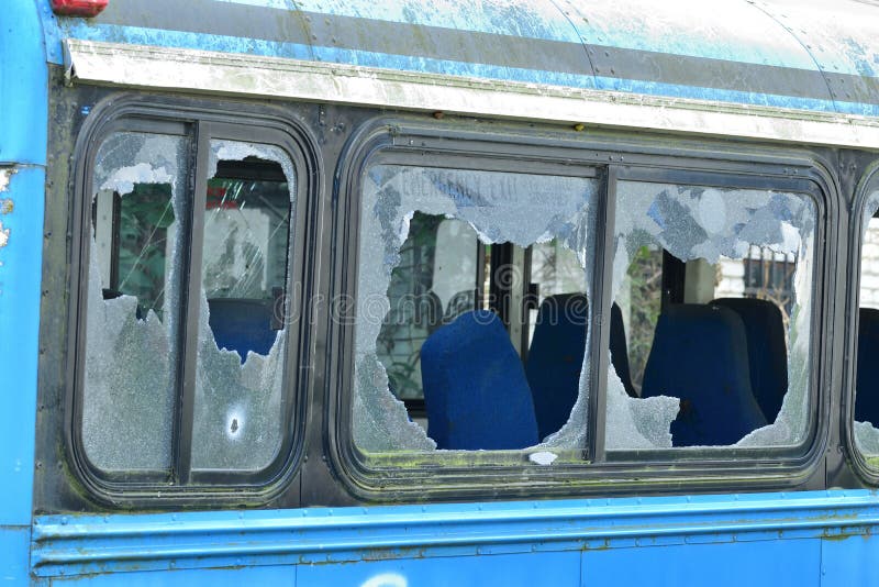 Dilapidated and Rusty Bus with Broken Windows in a Remote Area. Scrap ...
